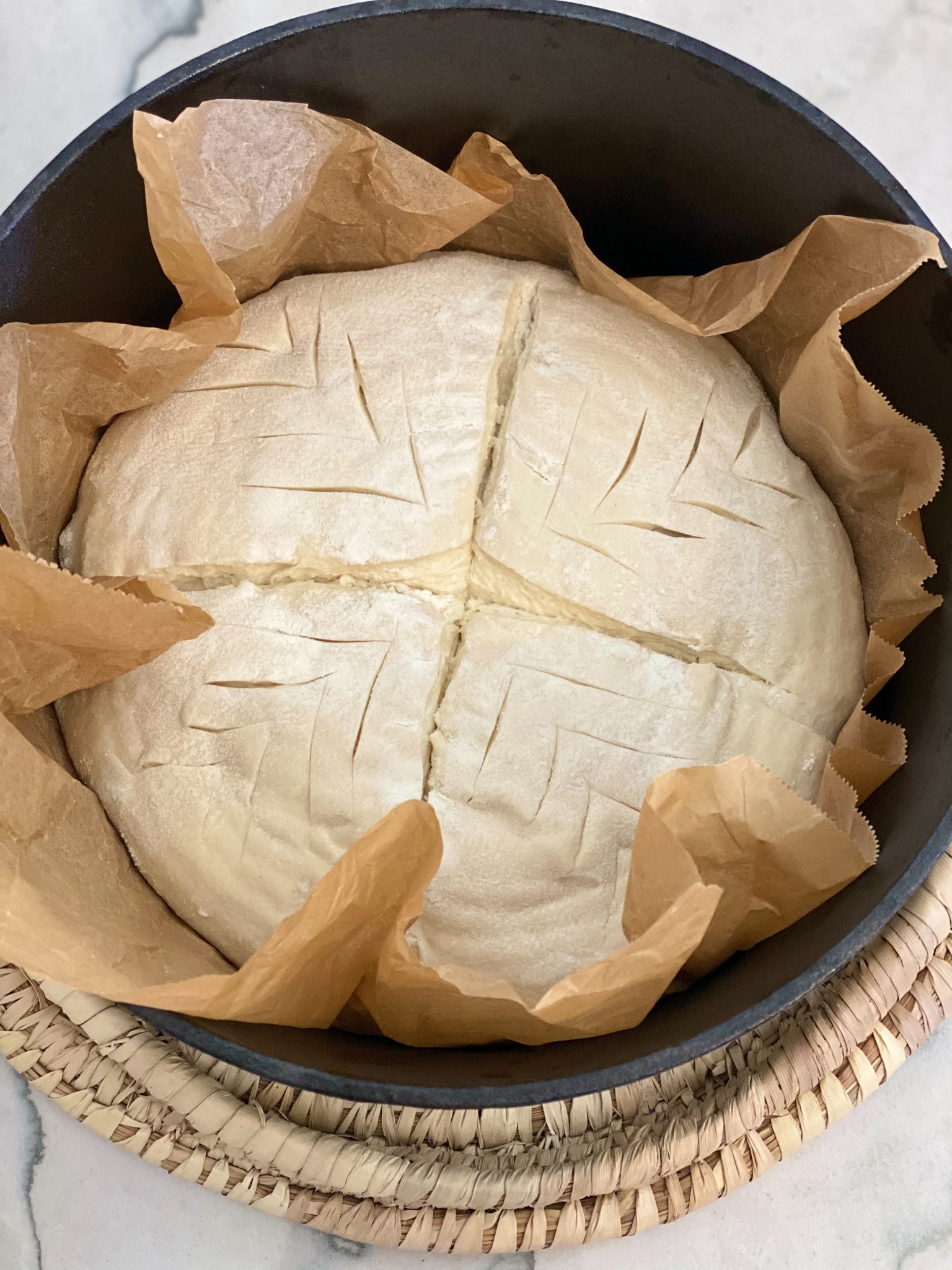 beginner guide: how to shape sourdough bread boule - lizasfarmhouse.com