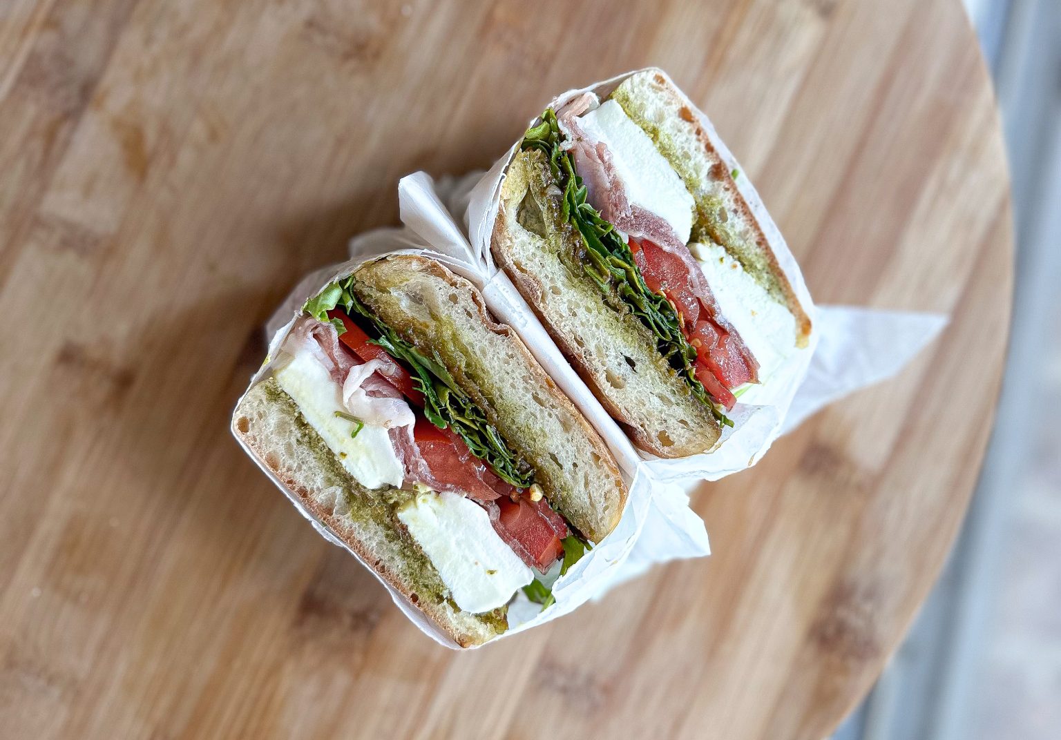 pesto caprese sandwich with a balsamic glaze - lizasfarmhouse.com