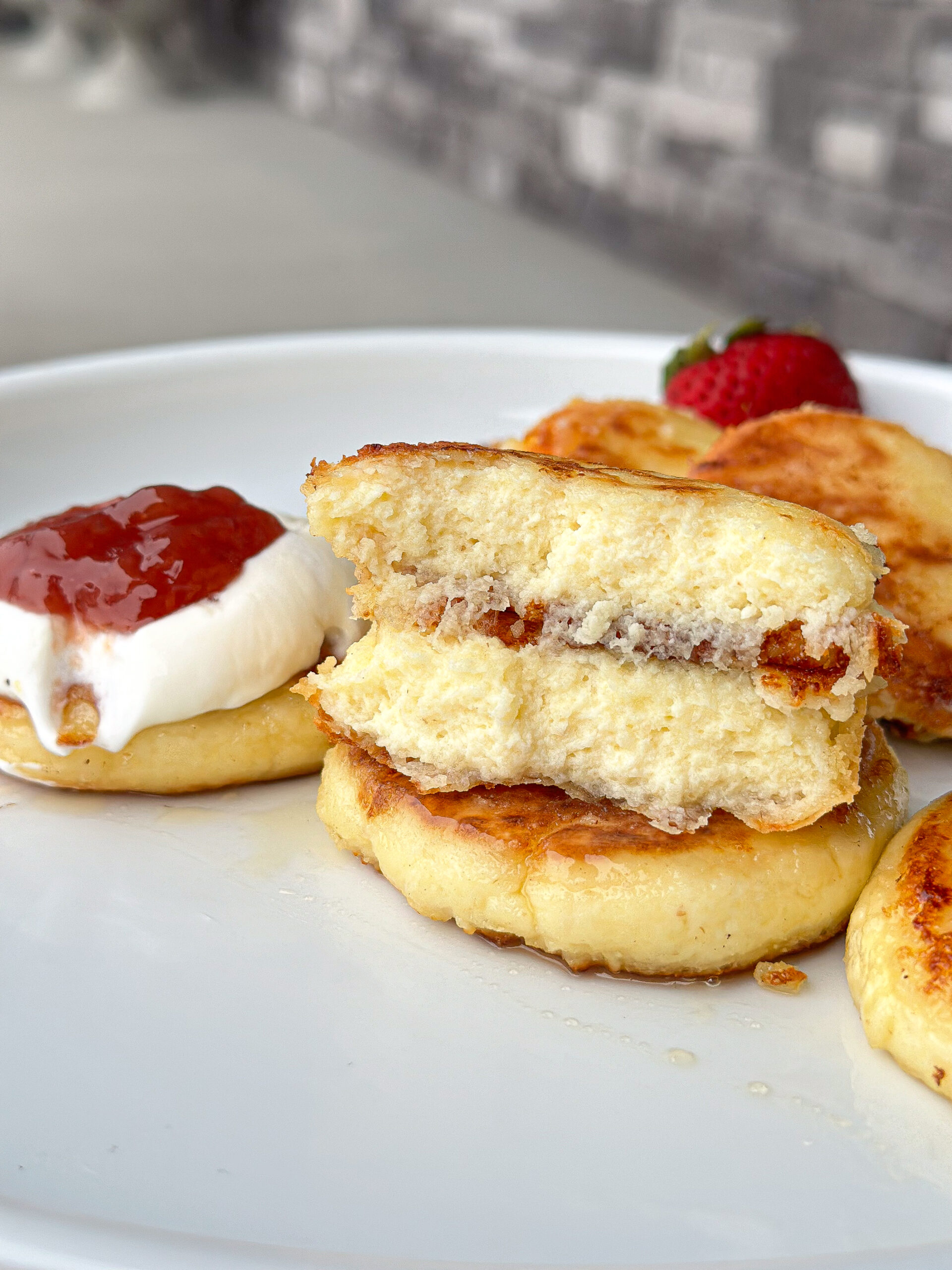 Syrniki (farmer's cheese pancakes) - lizasfarmhouse.com